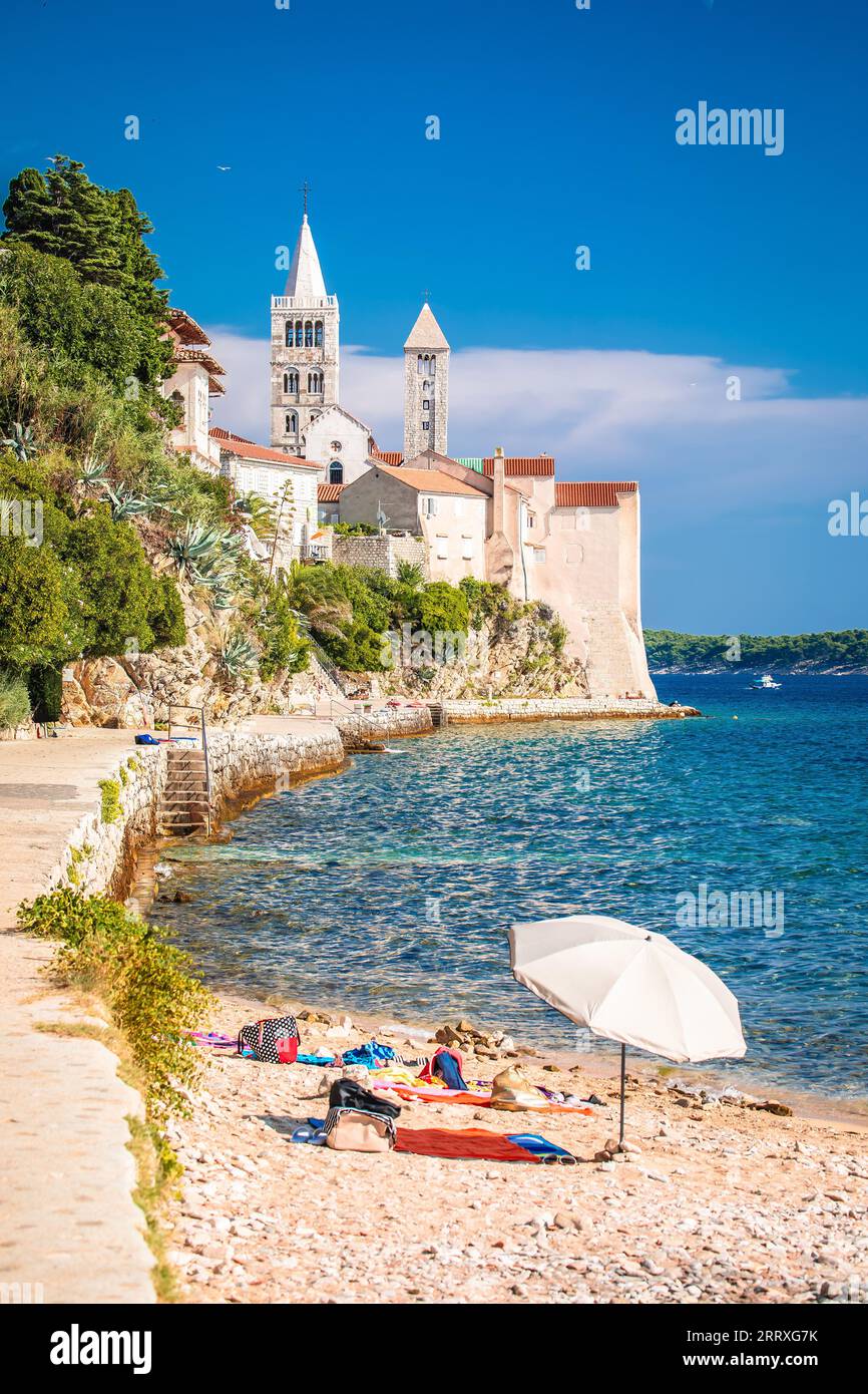 Historic town of Rab towers and beach walkway view, archipelago of ...