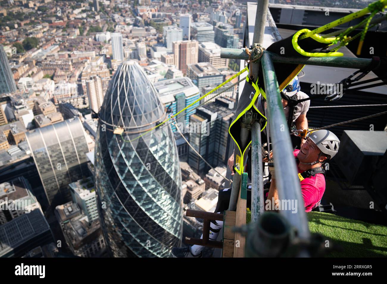 EDITORIAL USE ONLY Participants zip wire during the inaugural London ...