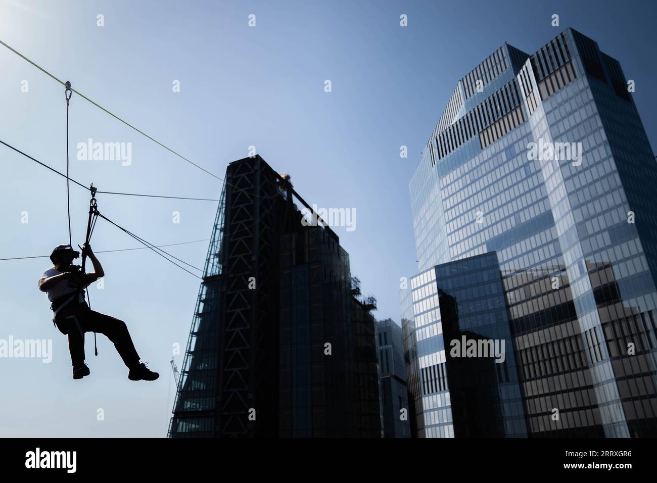 EDITORIAL USE ONLY Participants zip wire during the inaugural London ...