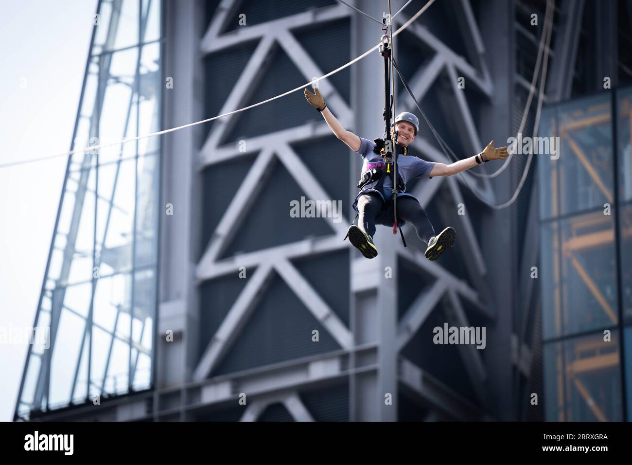 EDITORIAL USE ONLY Participants zip wire during the inaugural London ...