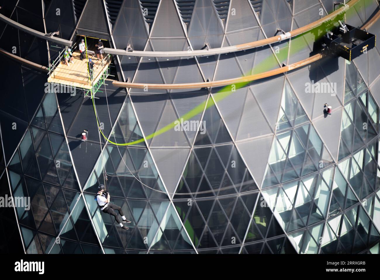 EDITORIAL USE ONLY Participants zip wire during the inaugural London ...