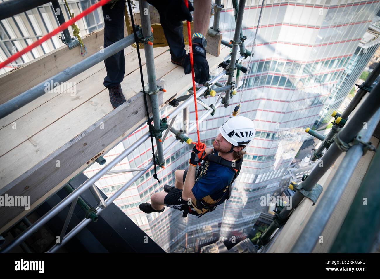 EDITORIAL USE ONLY Participants abseil during the inaugural London ...