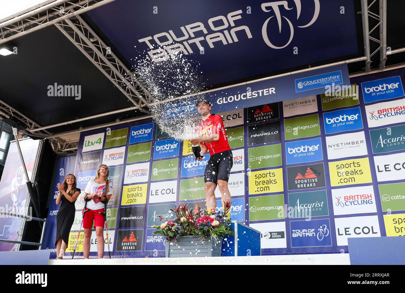 Stage winner Uno-X Pro Cycling Team's Rasmus Tiller celebrates on the ...