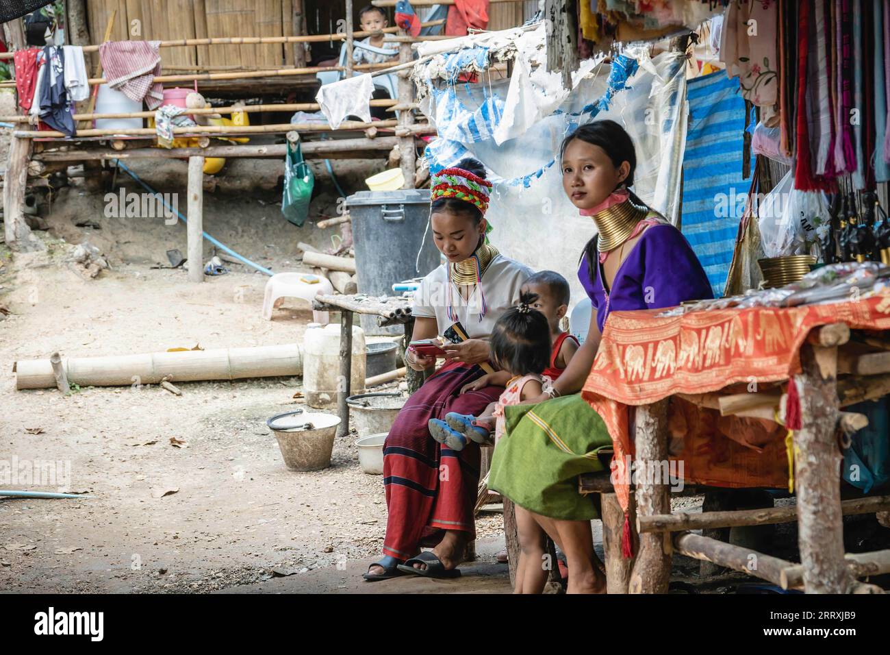 Karen long-neck tribe women and their kids are seen inside The Long ...