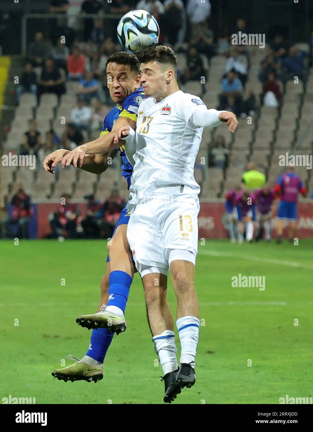 Zenica. 8th Sep, 2023. Fabio Luque Notaro (R) of Liechtenstein vies for ...