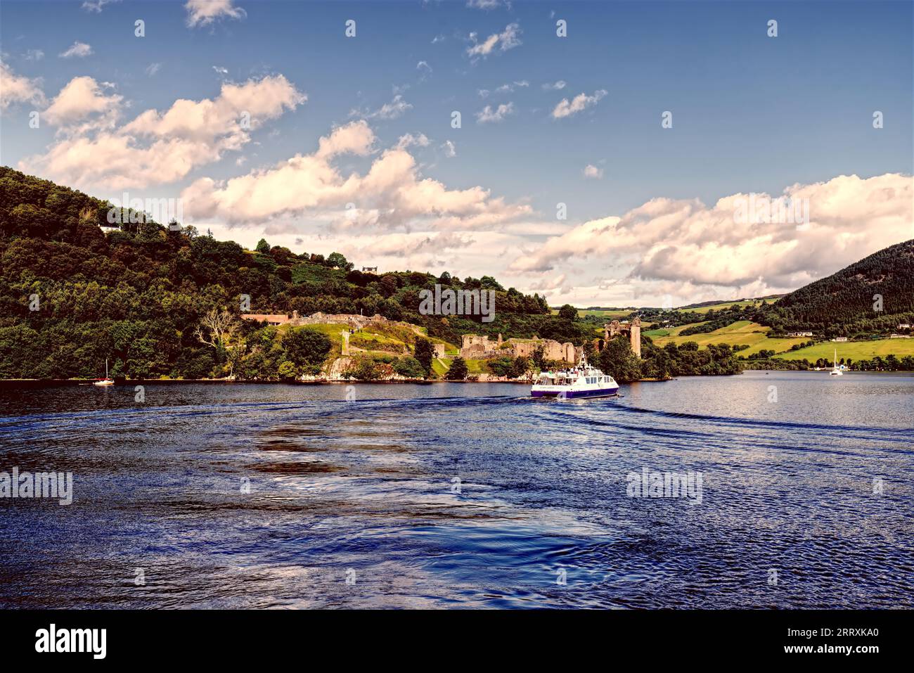 Journey to the Past: Passenger Ship Approaching Urquhart Castle on Loch ...