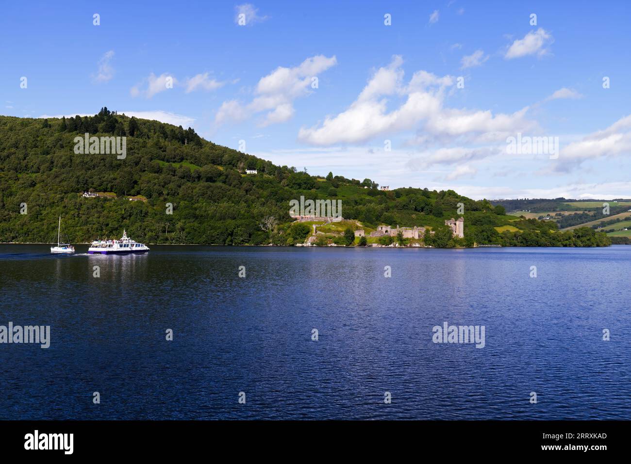 Sailing Through Legends: Passenger Ship En Route to Urquhart Castle on ...
