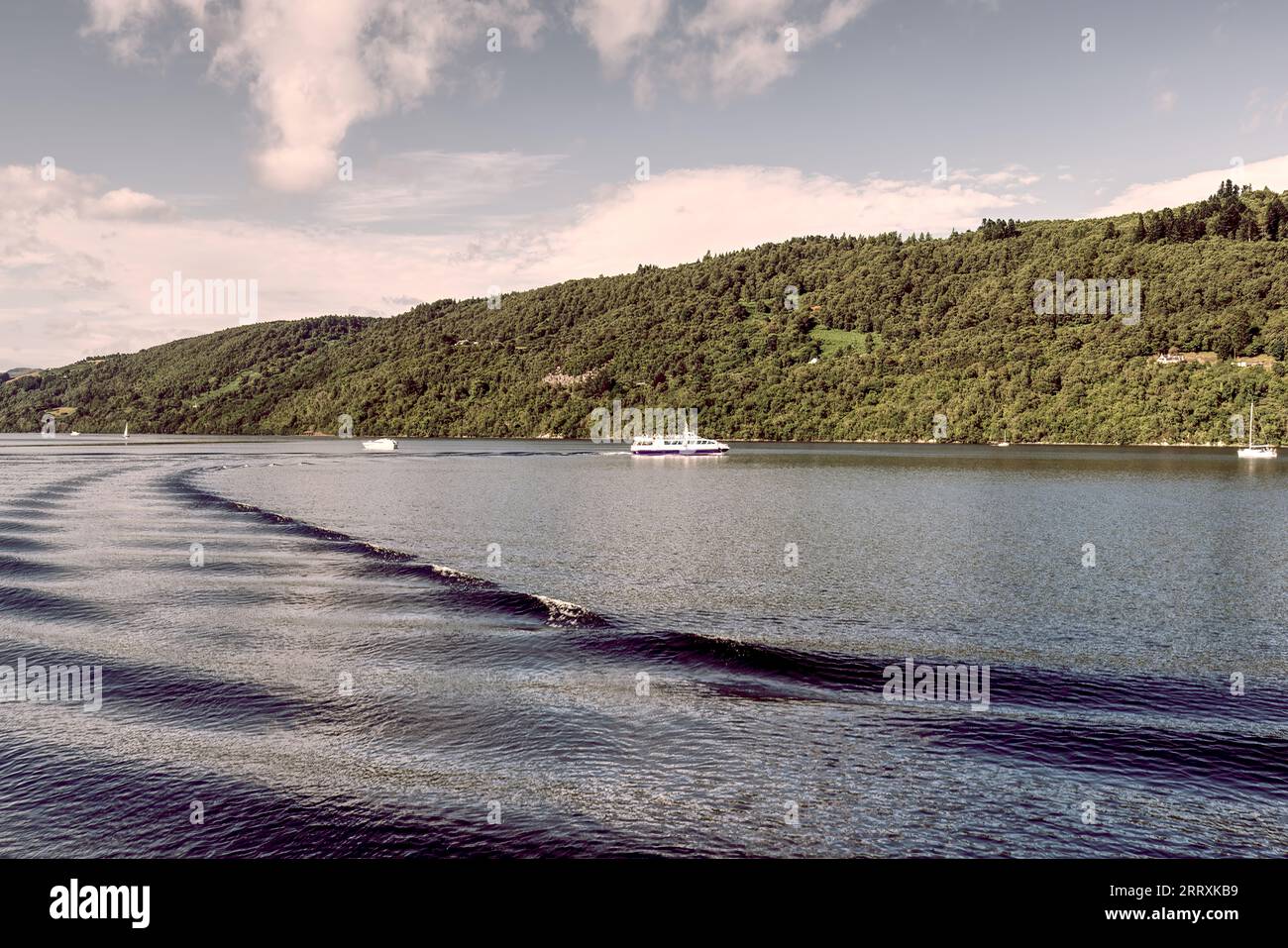 Echoes on the Loch: Passenger Ship Making Waves on Loch Ness Stock ...