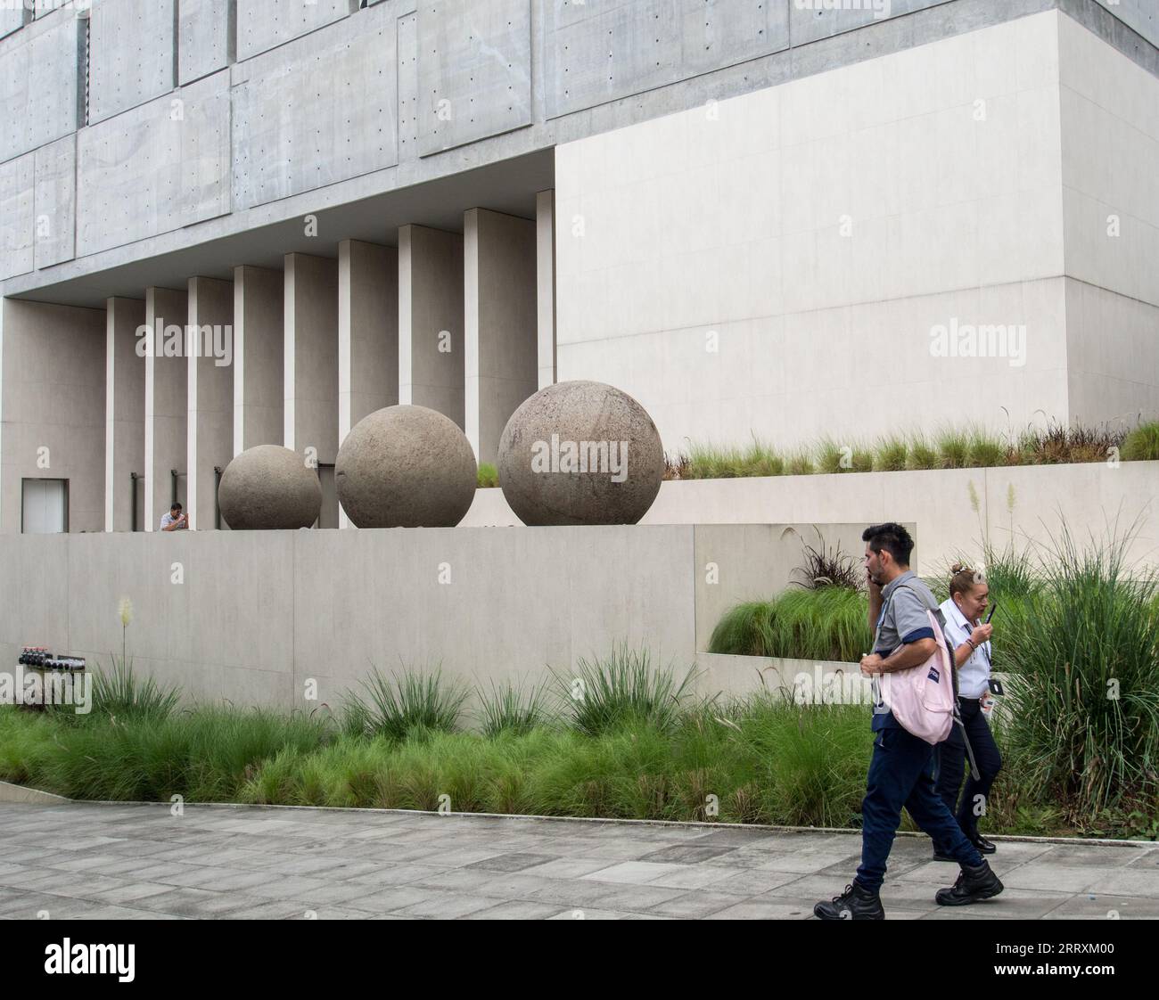 Three ancient stone spheres on display in front of the Costa Rican ...