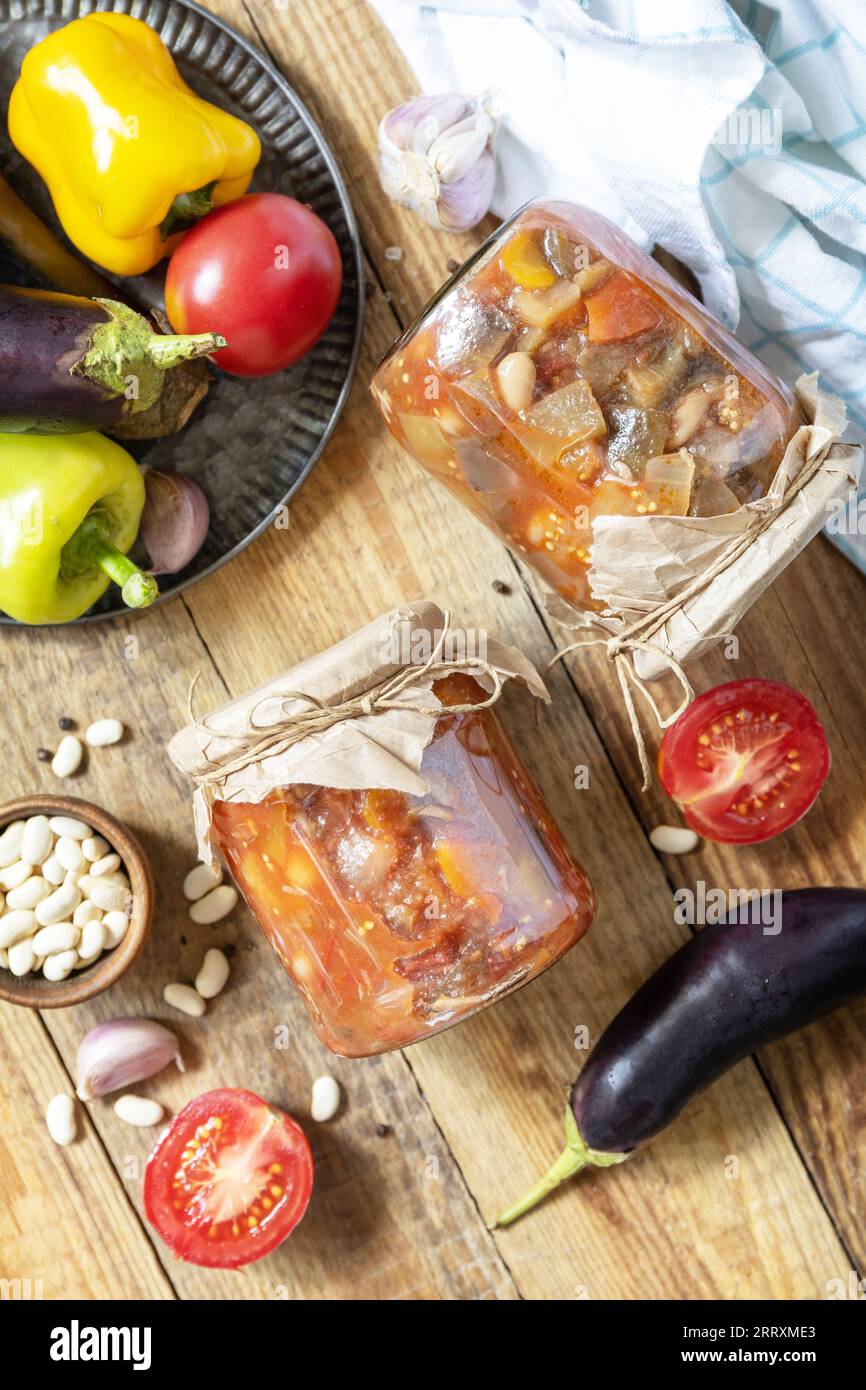 Healthy homemade fermented food. Salad eggplant with beanson a rustic ...
