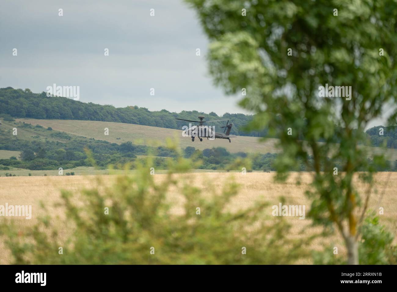 British army Boeing Apache Attack helicopter (AH-64E Army Air) in low ...