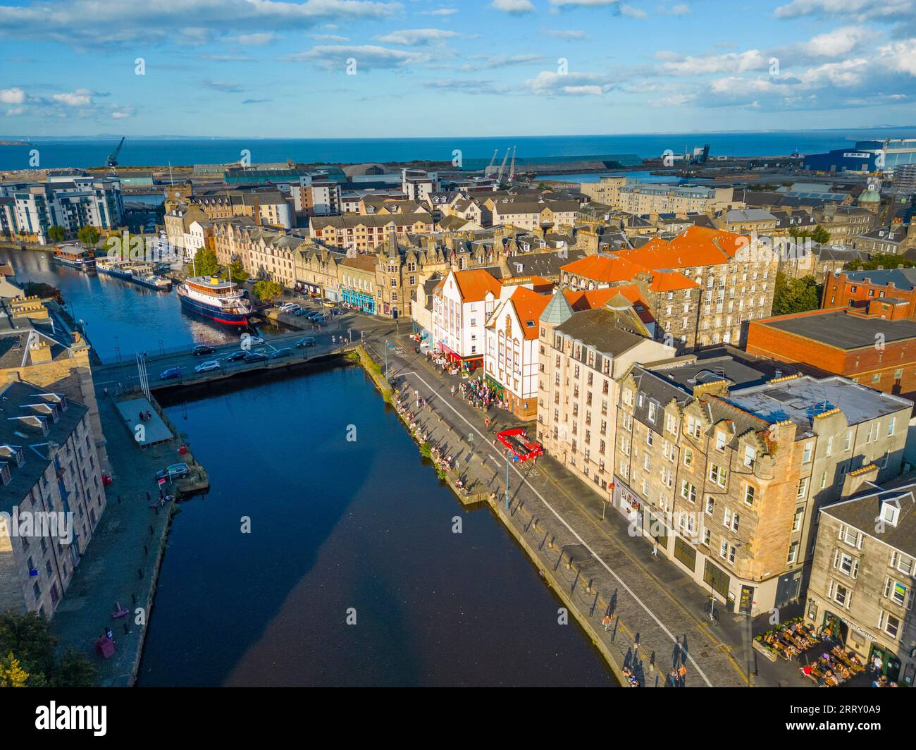 Aerial view in late afternoon of popular The Shore riverside district ...