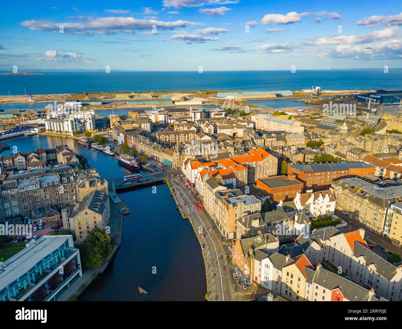 Aerial view in late afternoon of popular The Shore riverside district ...
