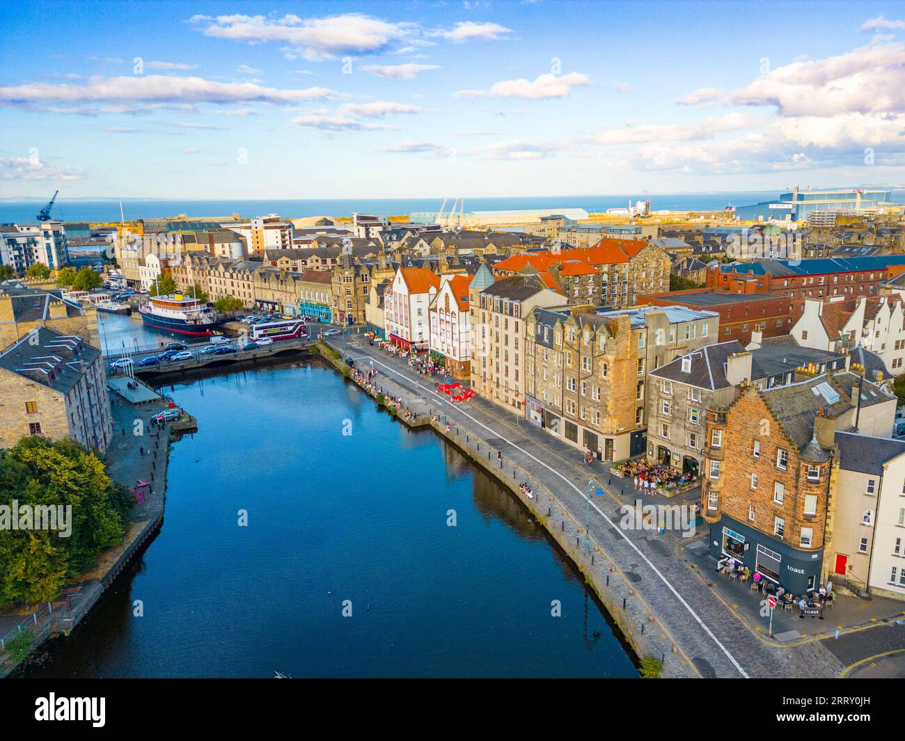 Aerial view in late afternoon of popular The Shore riverside district ...