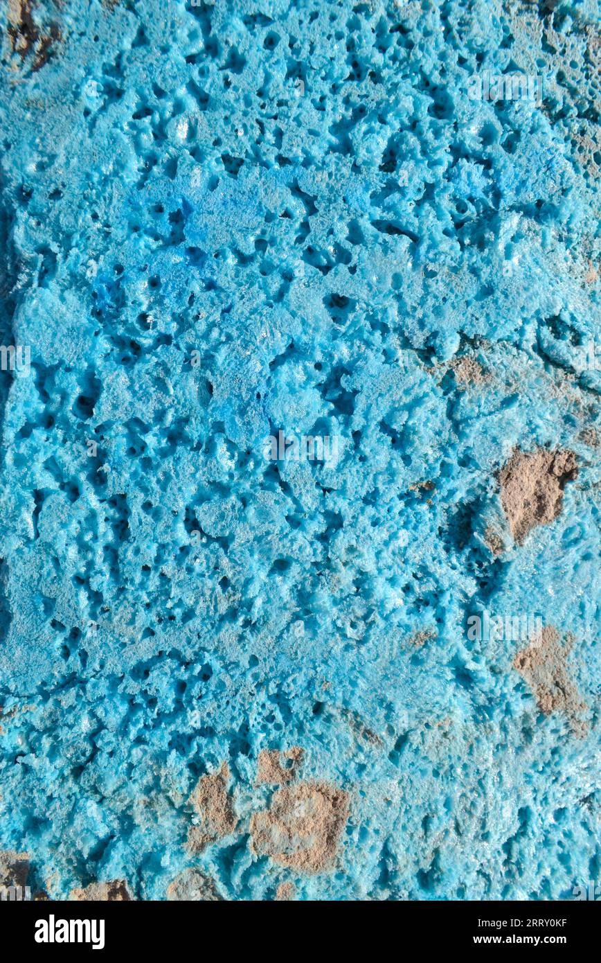 artistic texture blue polyurethane foam in a cut with elements of gray ...