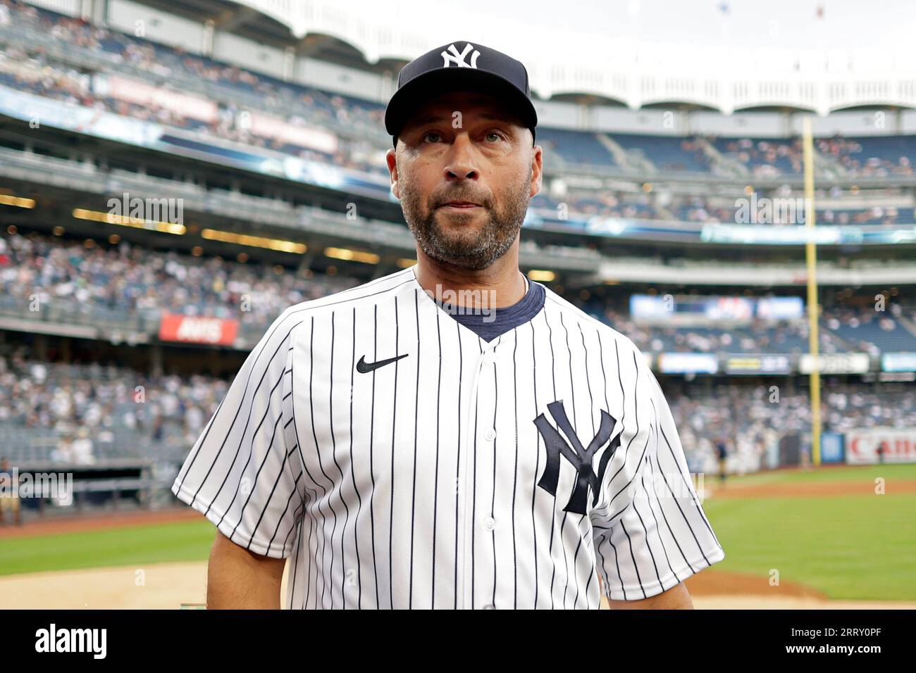 Former New York Yankees' Derek Jeter walks off the field after the Yankees Old-Timers' Day ...