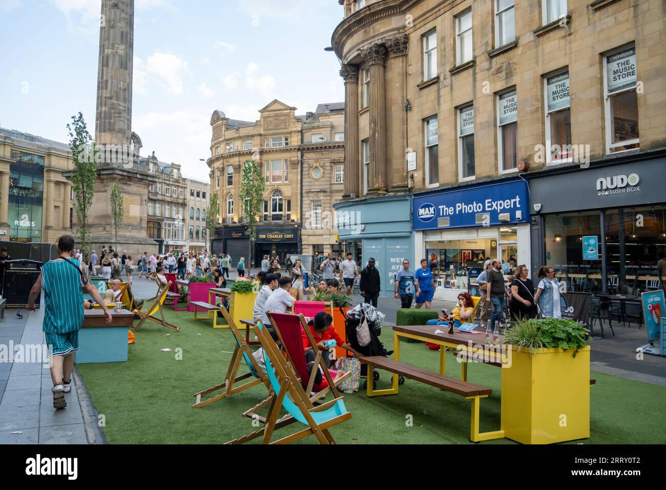 People relaxing in the city centre in an urban garden created by NE1 ...