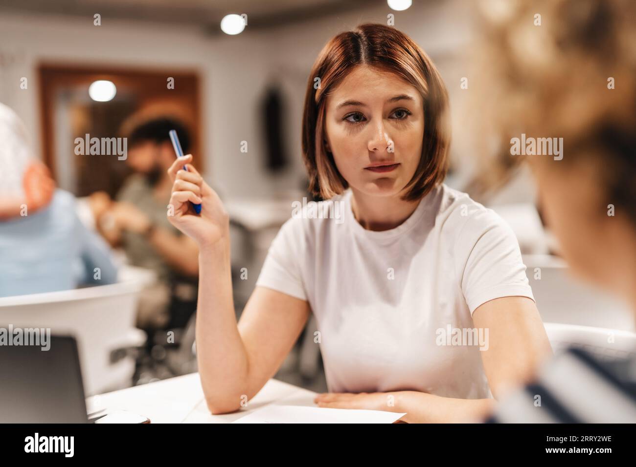 Classroom learning. Business education. Business team learning. Discussing in meeting ...