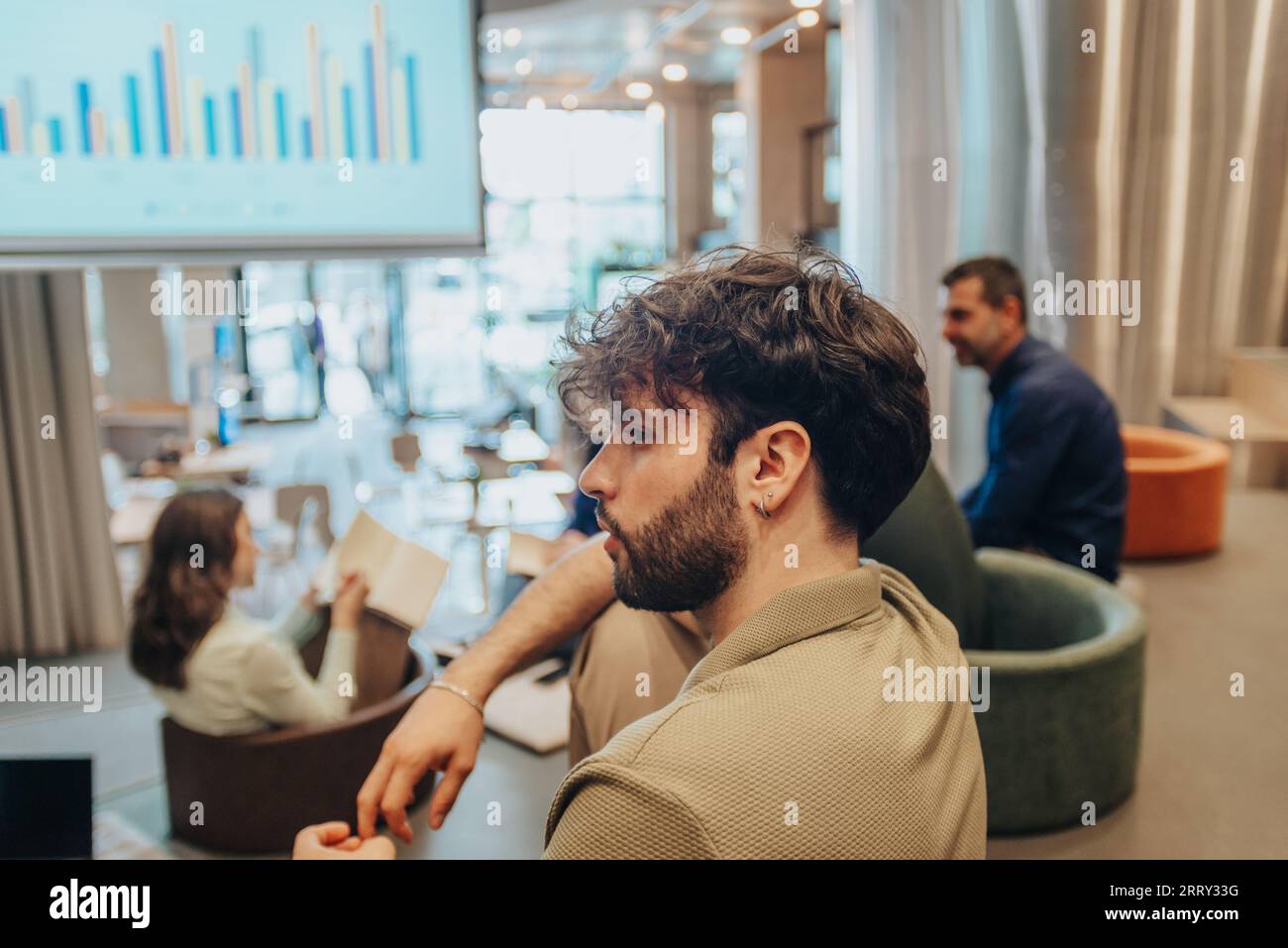 Side view photo of good looking male employee listening to his ...