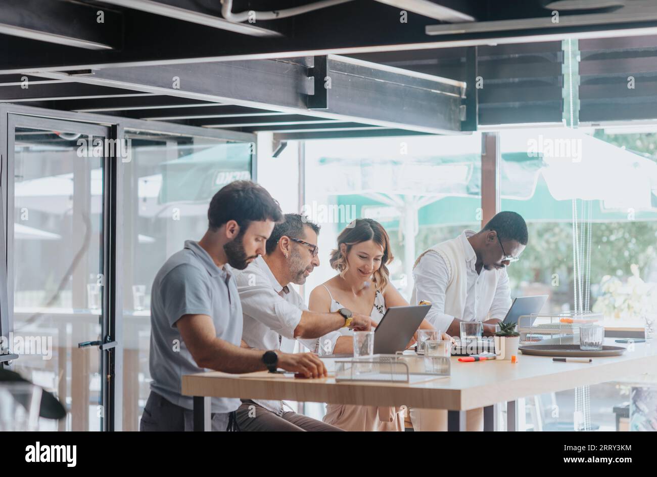 Group of confident, diverse businesspeople in a creative office ...