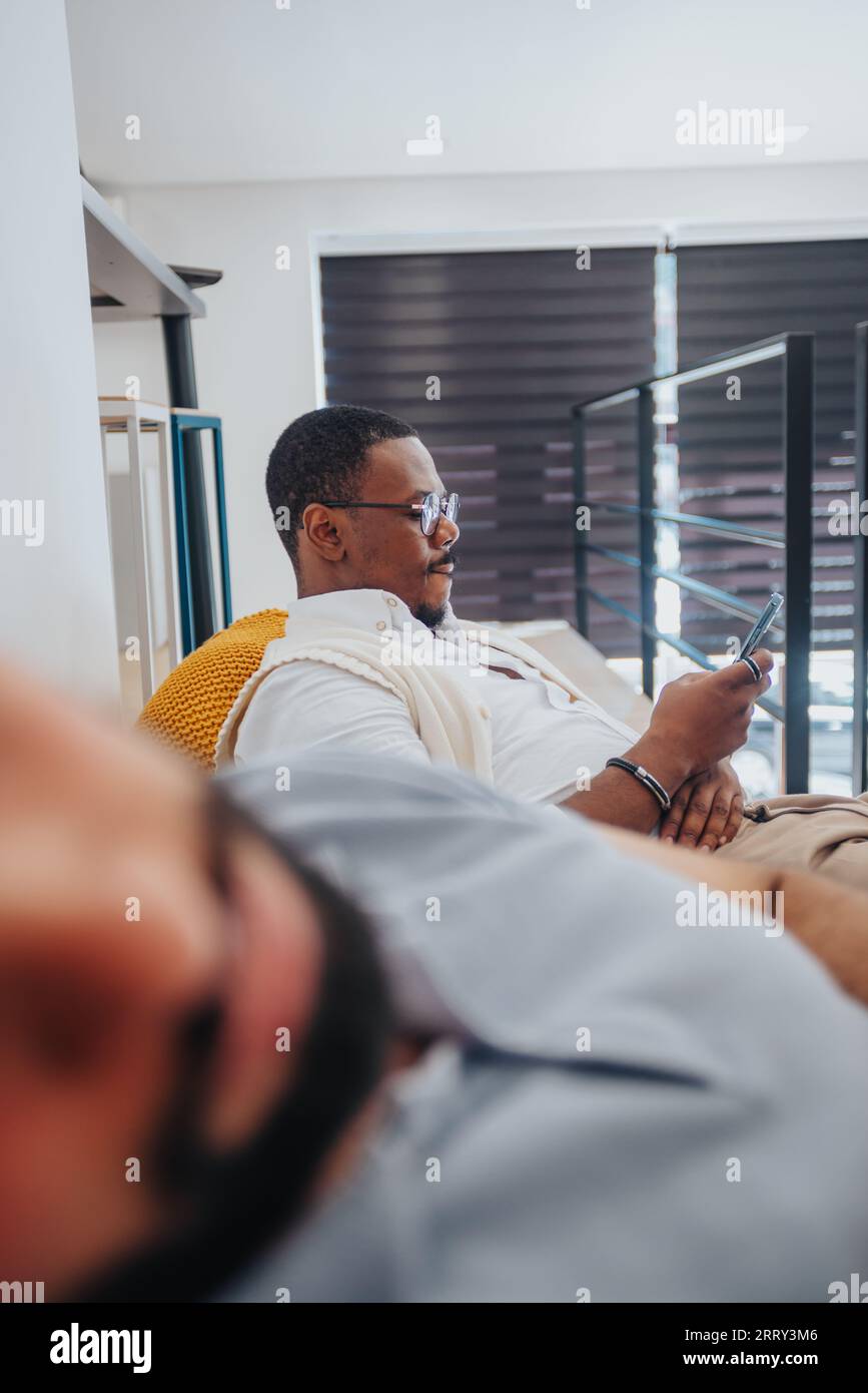 Multigenerational professionals enjoy a refreshing break, engaging in ...