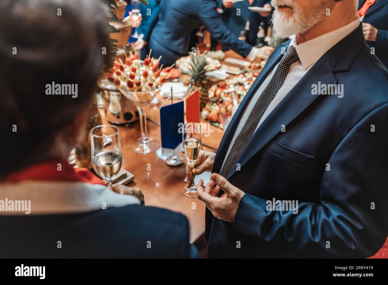 Achievement celebration: Accomplished adult business team celebrates ...