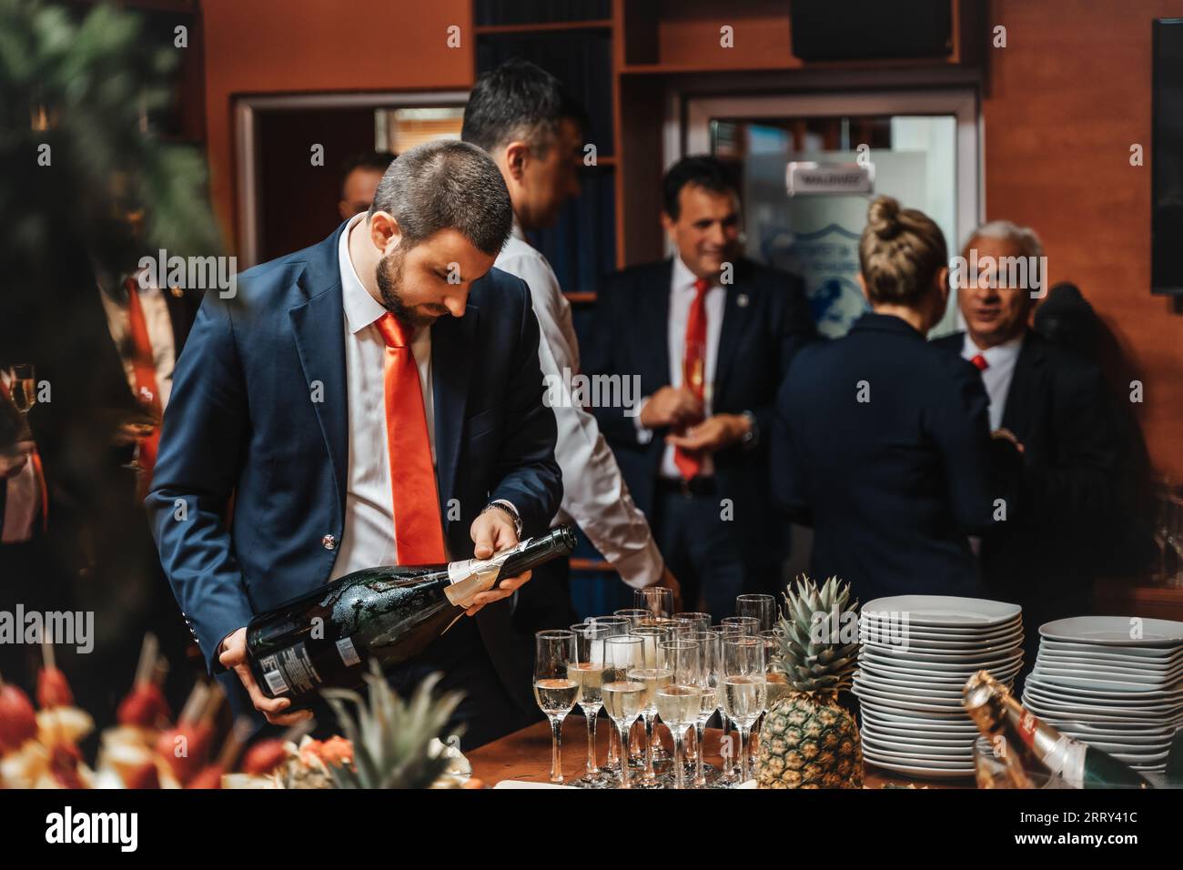 Celebrate business success with a grand company event. A large group ...