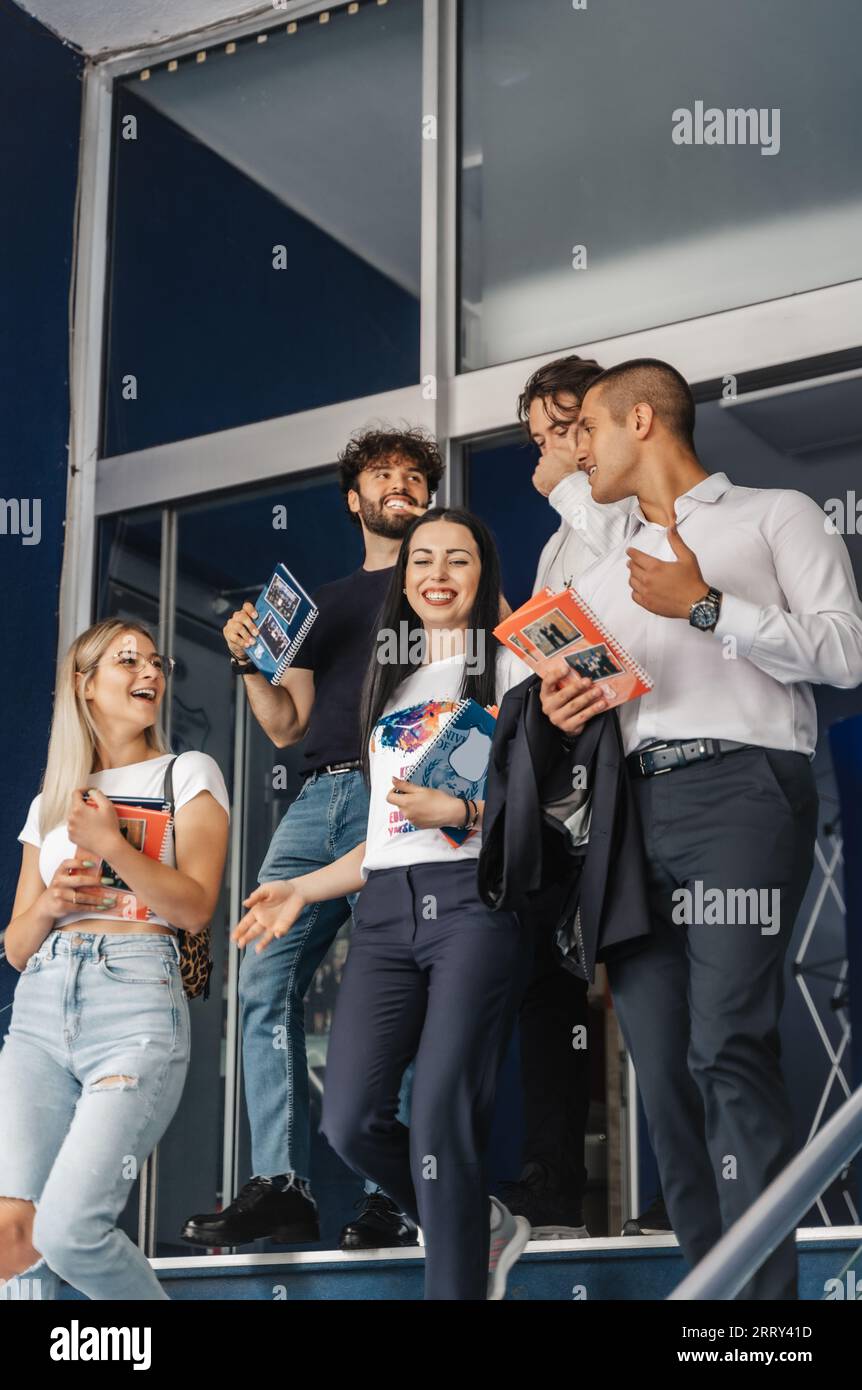 Happy University Students Having a Multicultural Group Discussion ...