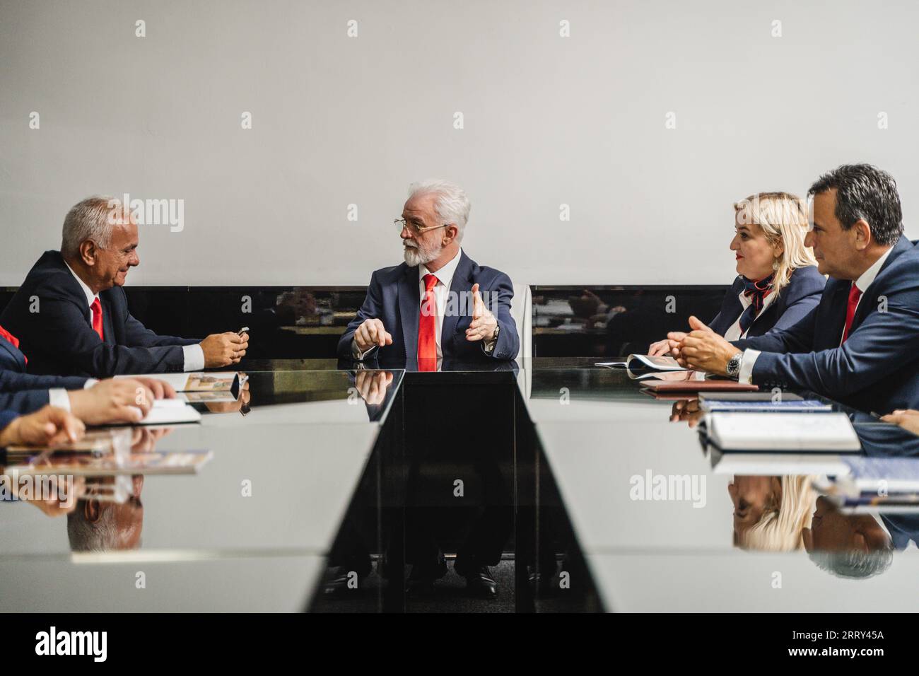 Large group of businesspeople in a modern office conference room ...