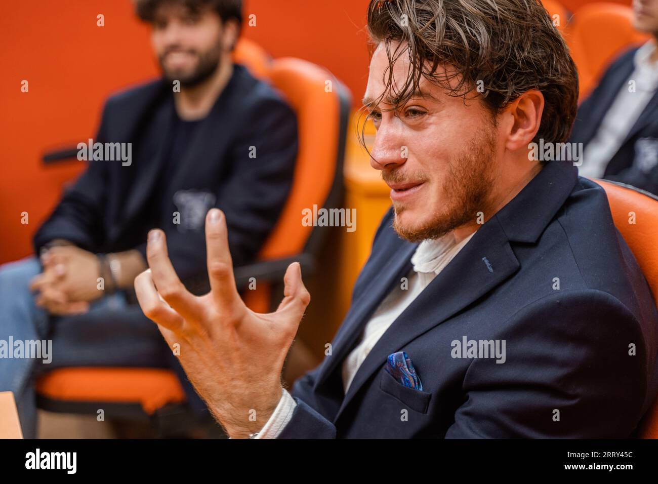 Very emotional student looking disturbed and stressed while attending a ...