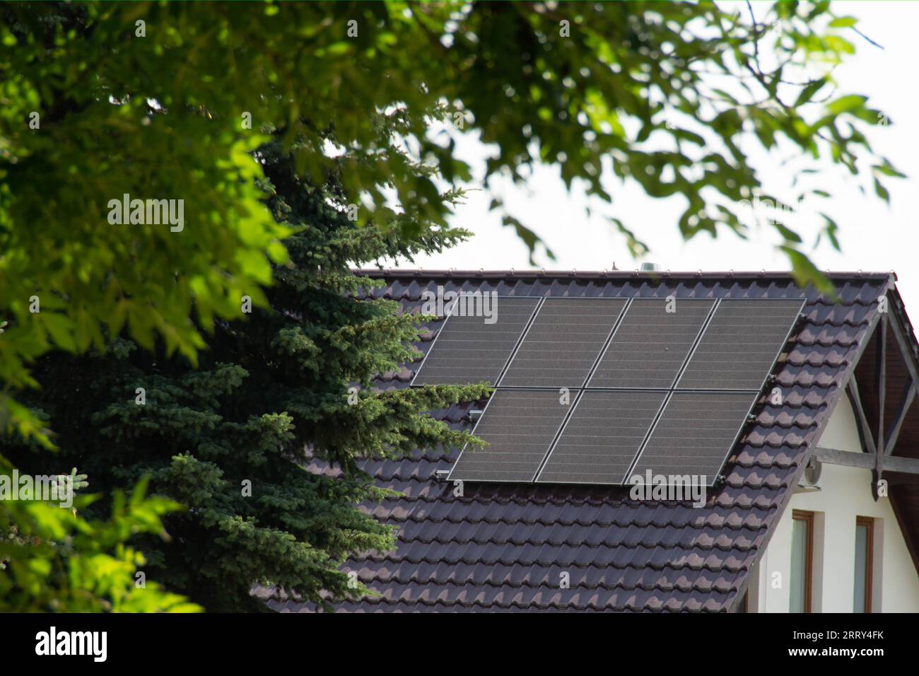 Installing a Solar Cell on a Roof Stock Photo - Alamy