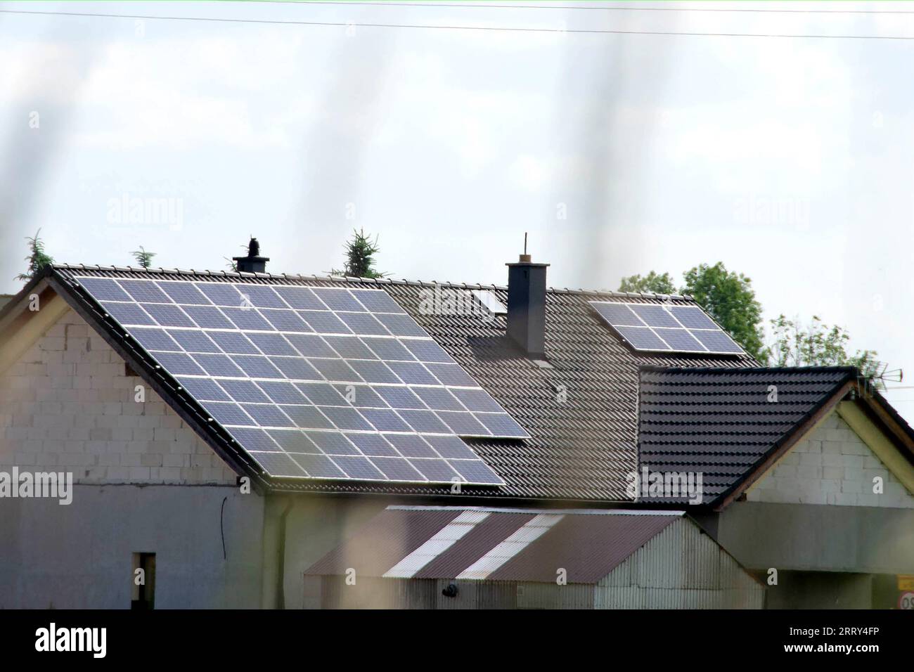 Installing a Solar Cell on a Roof Stock Photo - Alamy