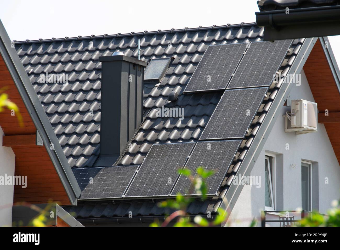 Installing a Solar Cell on a Roof Stock Photo - Alamy