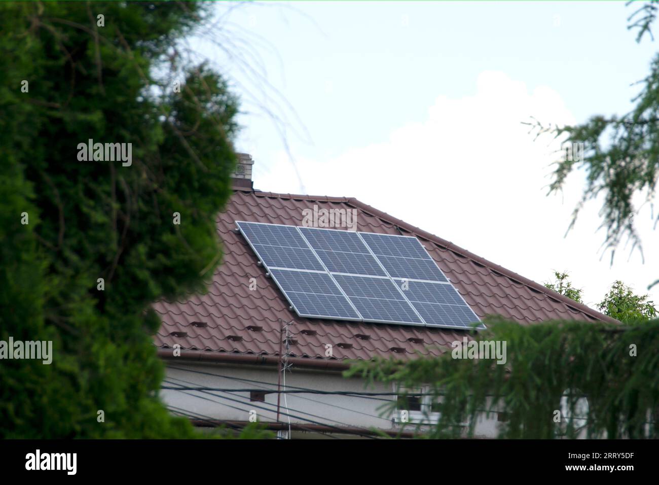 Installing a Solar Cell on a Roof Stock Photo - Alamy