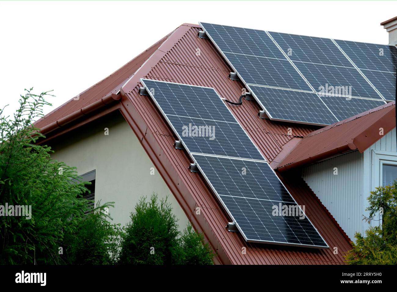 Installing a Solar Cell on a Roof Stock Photo - Alamy