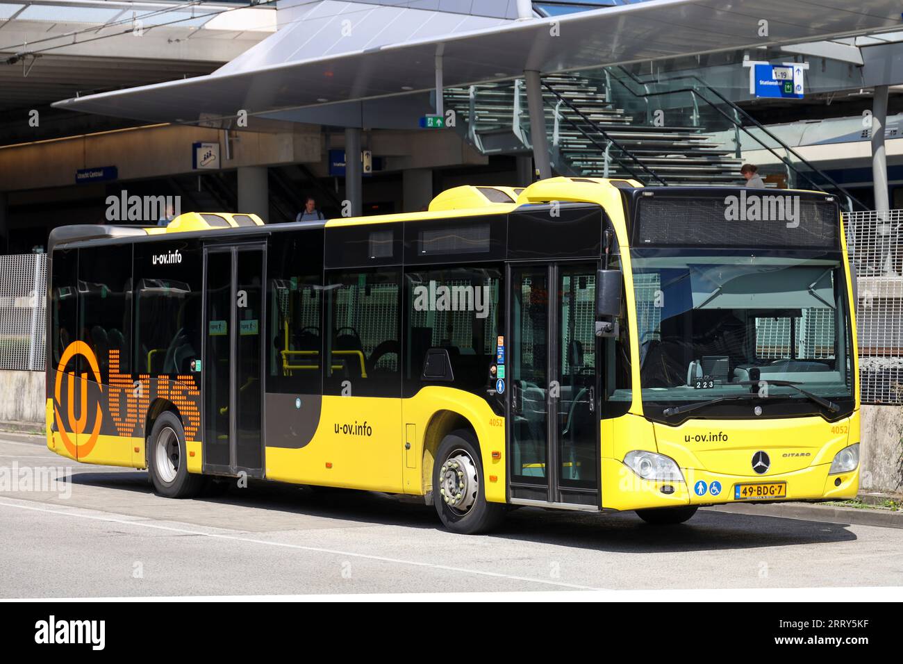 City bus in yellow color of U-OV runned by Qbuzz in Utrecht the ...