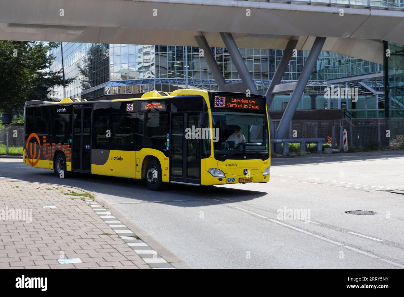 City bus in yellow color of U-OV runned by Qbuzz in Utrecht the ...