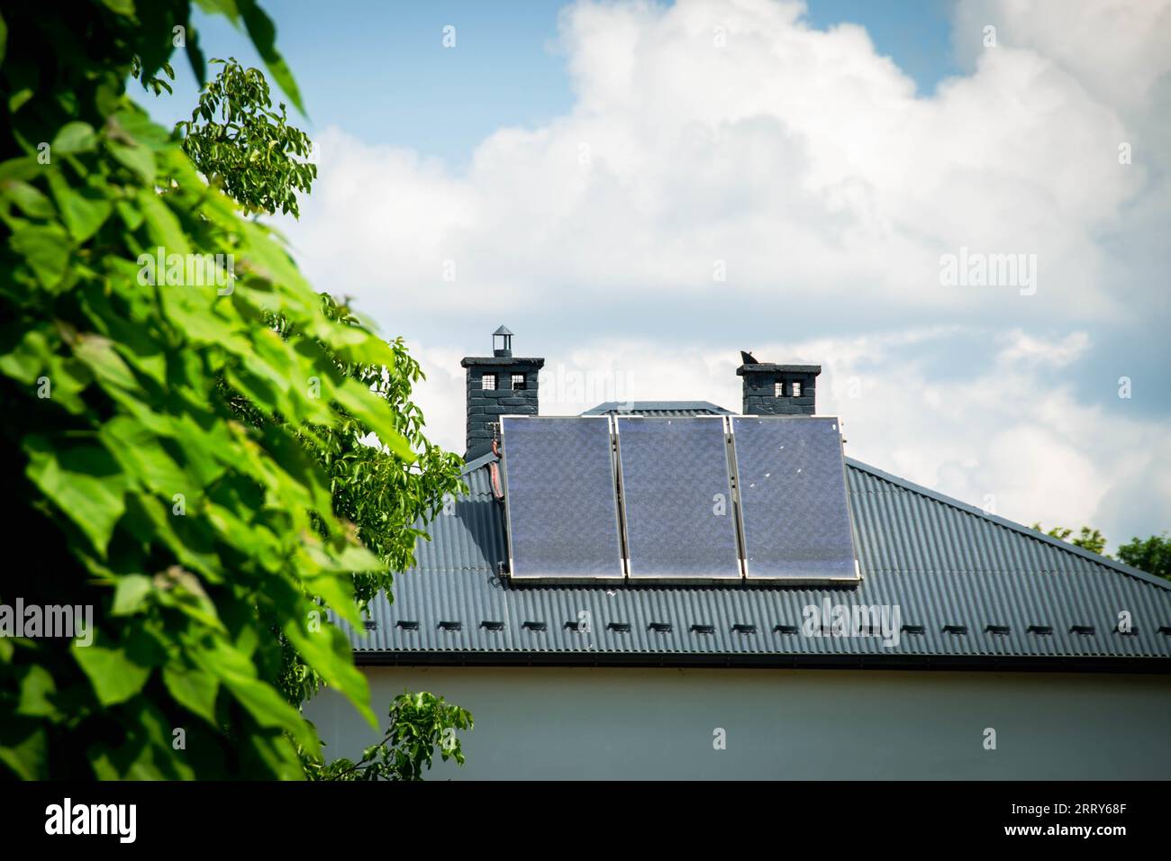 Installing a Solar Cell on a Roof Stock Photo - Alamy