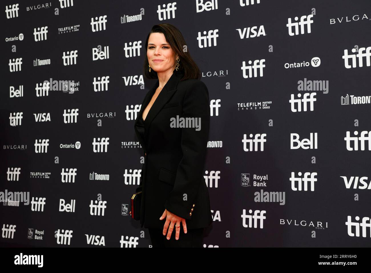 Neve Campbell is photographed on the red carpet for the film "Swan Song ...
