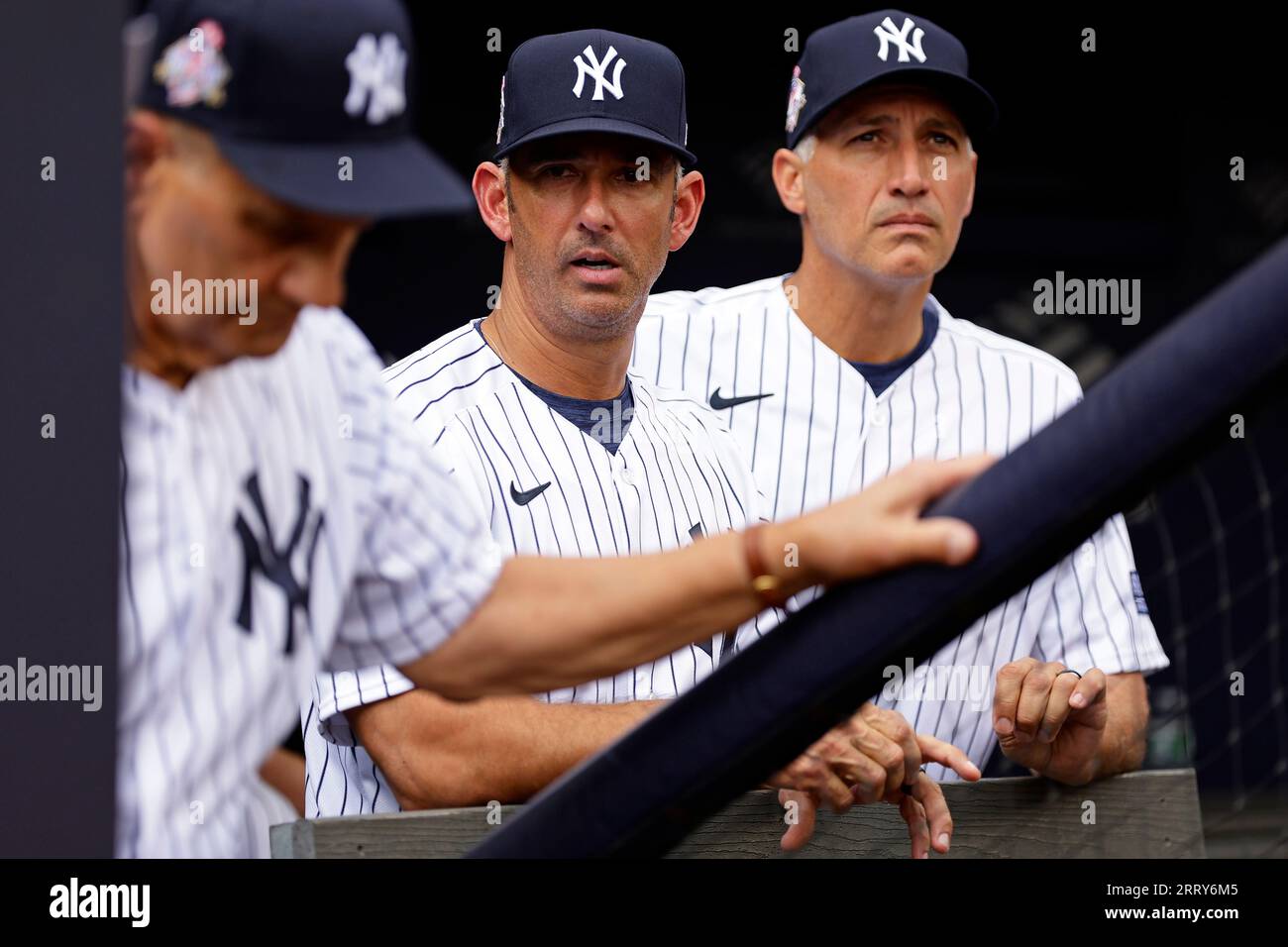 Former New York Yankees' Joe Torre, Jorge Posada, center, and Andy ...