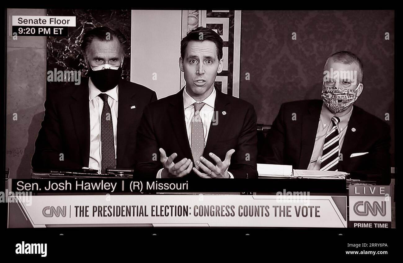 A CNN screenshot of U.S. Senator Josh Hawley on Jan. 6, 2021, during ...