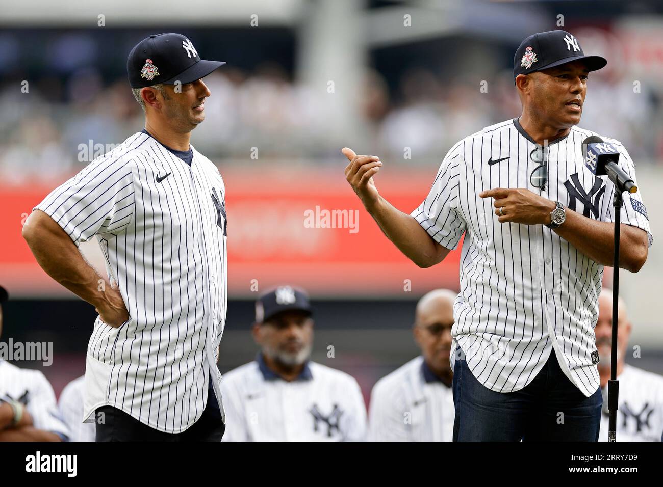 Former New York Yankees' Jorge Posada, left, and Andy Pettitte speak during Yankees Old-Timers ...