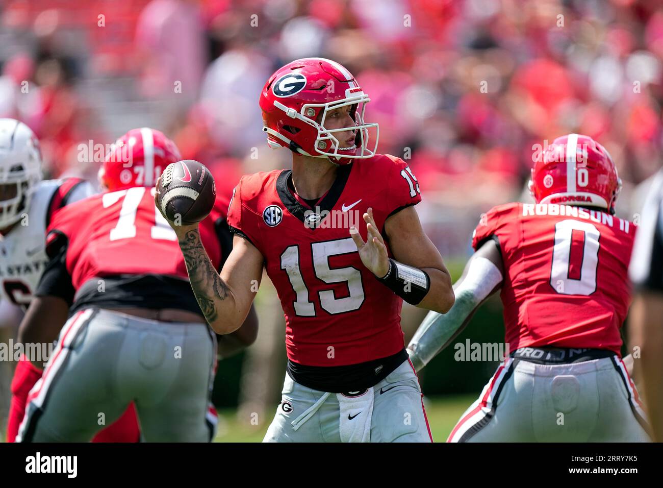 Georgia quarterback Carson Beck (15) looks for an open reciever in the ...