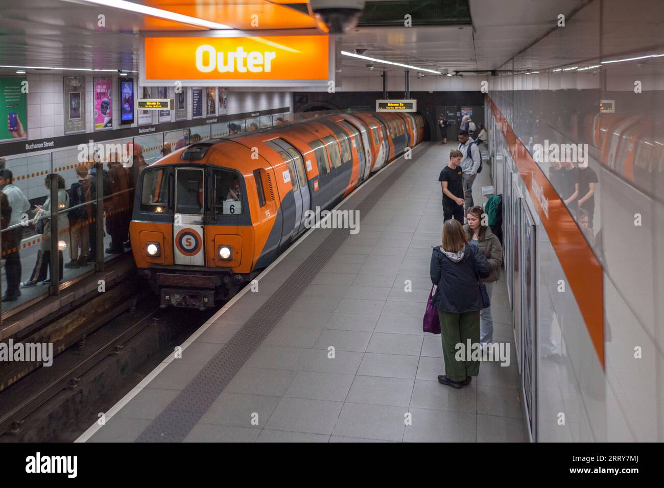 SPT subway train arriving at Glasgow Buchanan street underground station on the Glasgow ...