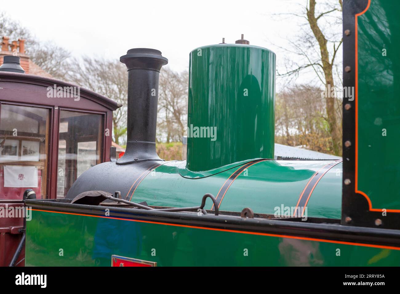 Close-up of funnel, steam dome and boiler of steam locomotive "Axe", at ...