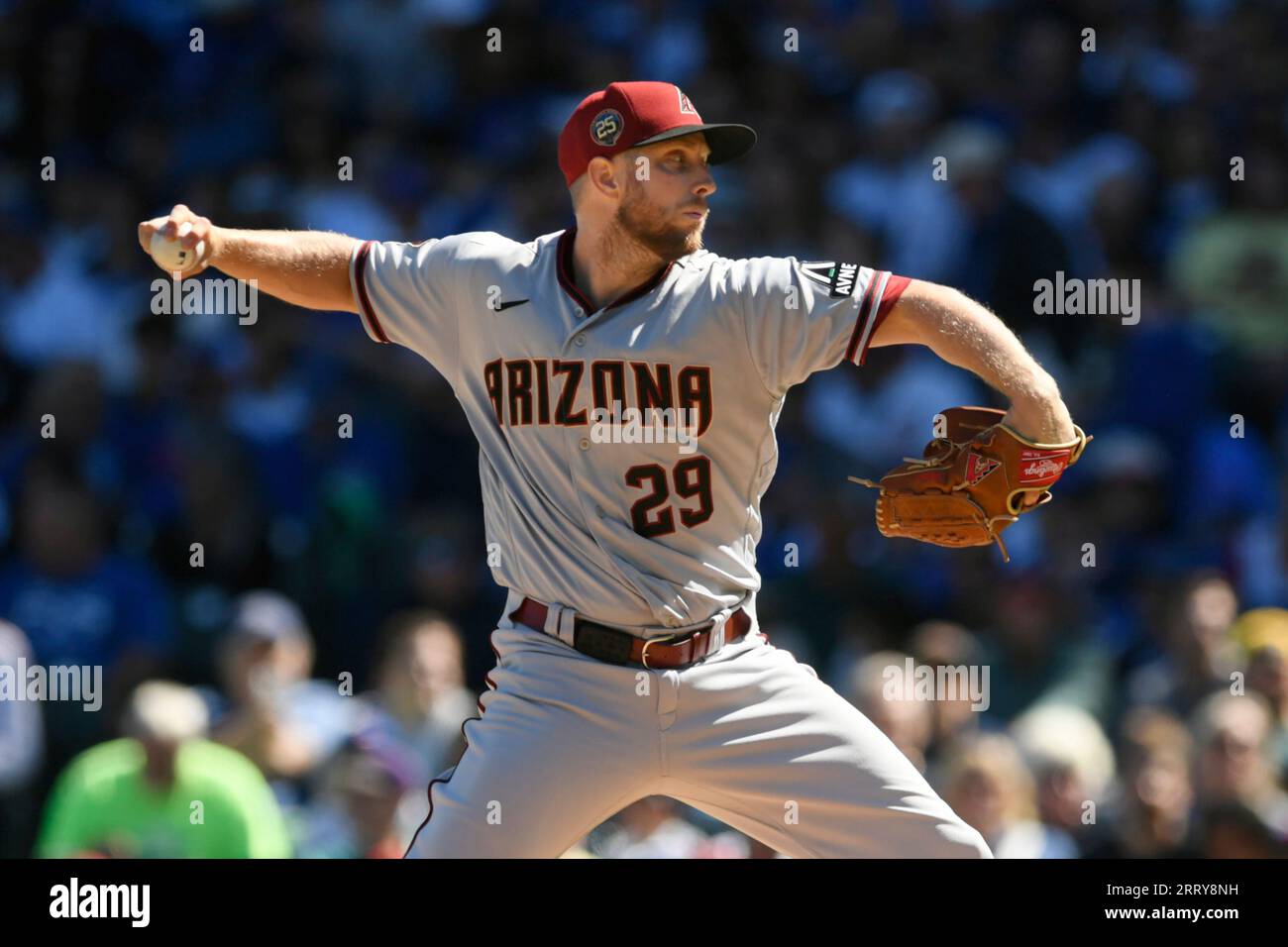 Arizona Diamondbacks starter Merrill Kelly delivers a pitch during the ...
