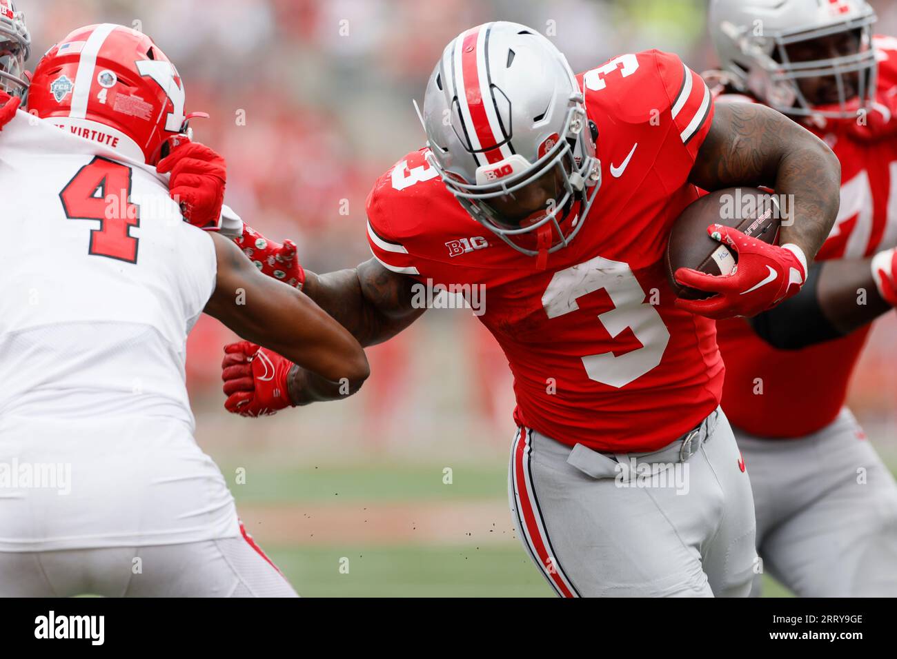 Ohio State running back Miyan Williams, right, runs past Youngstown ...