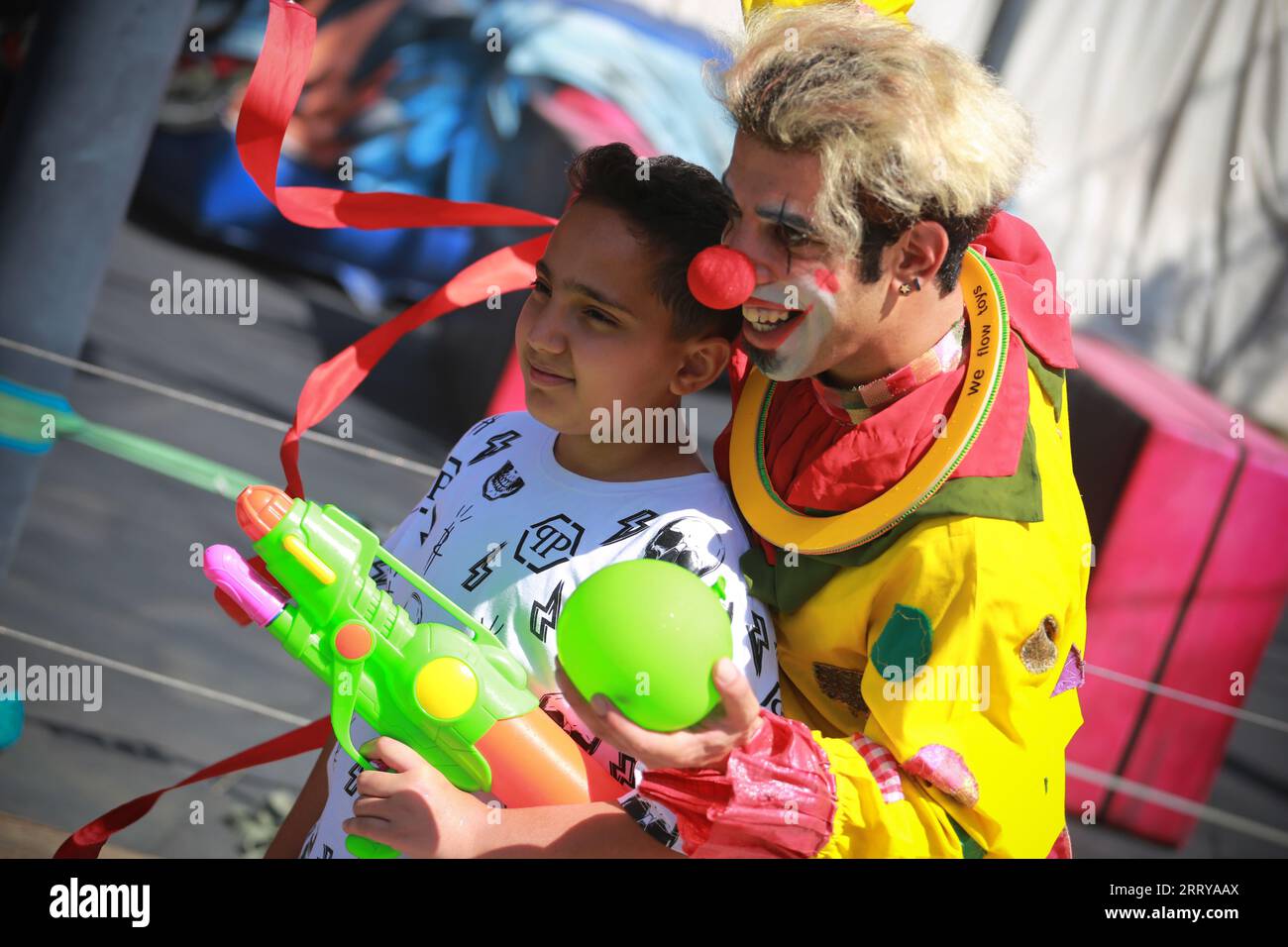 Tehran, Iran. 8th Sep, 2023. A clown and a child pose for a photo as ...