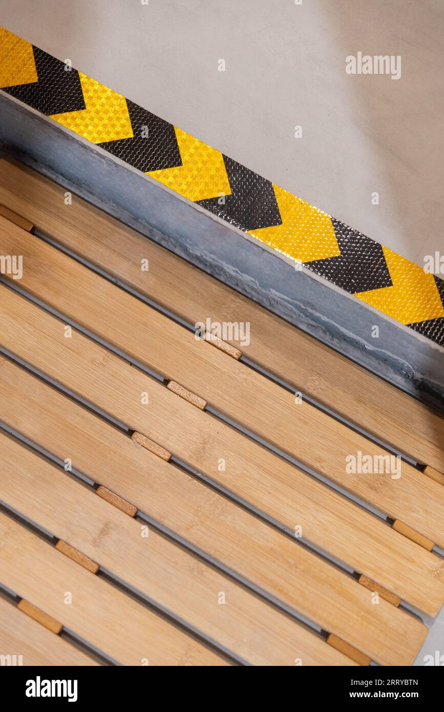 Warning sign floor shot in studio Stock Photo - Alamy