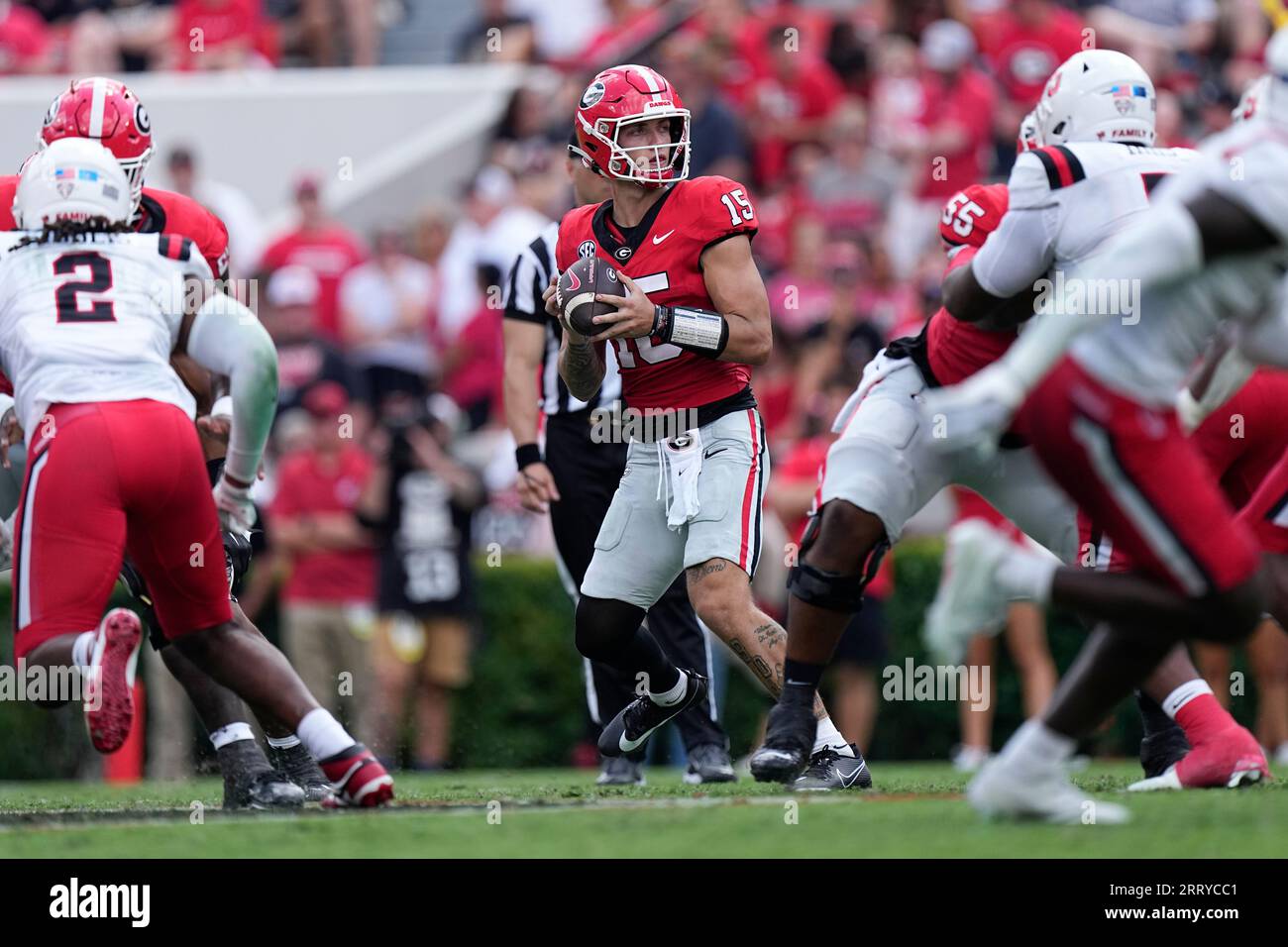 Georgia quarterback Carson Beck (15) drops to pass against Ball State ...